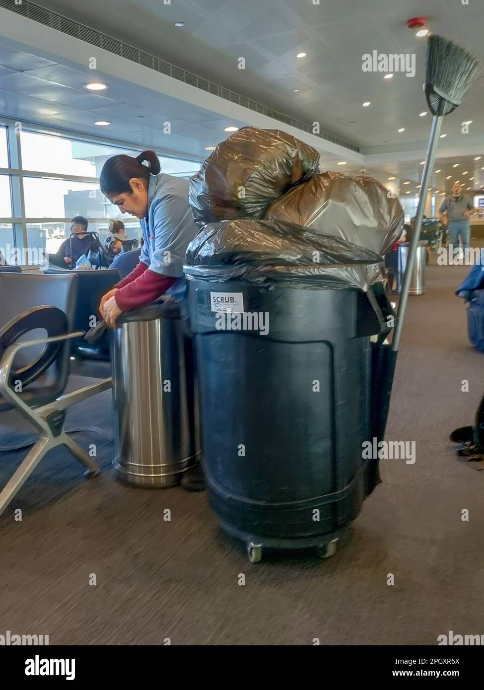 Chicago, Illinois - A cleaner removes trash from the International ...