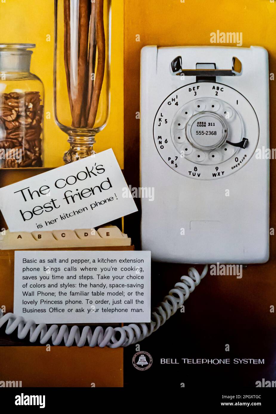 Bell kitchen phone advert in a Natgeo magazine, October 1962 Stock ...