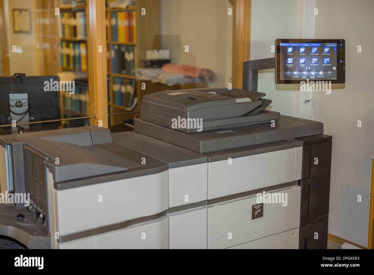 Office building interior with SHARP color laser multifunction printer ...