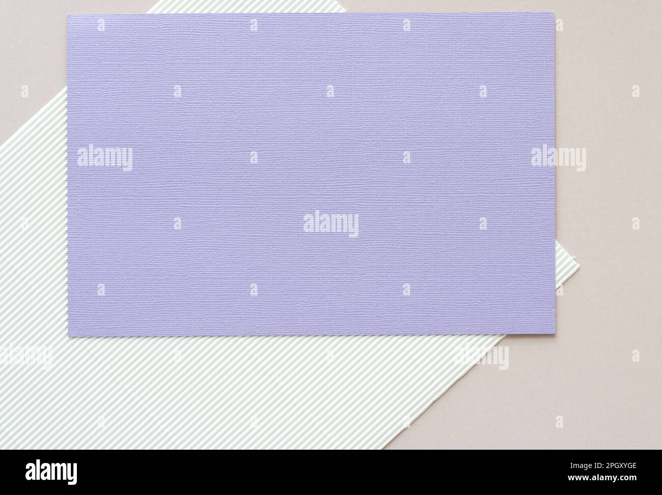 paper background featuring an isolated mauve card with texture Stock ...
