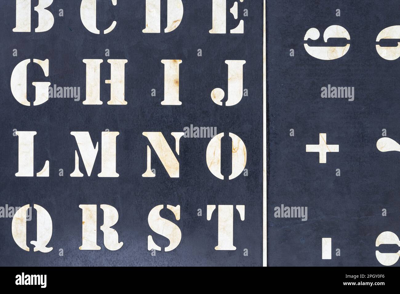 galvanized sheet metal stencil - backlit Stock Photo - Alamy