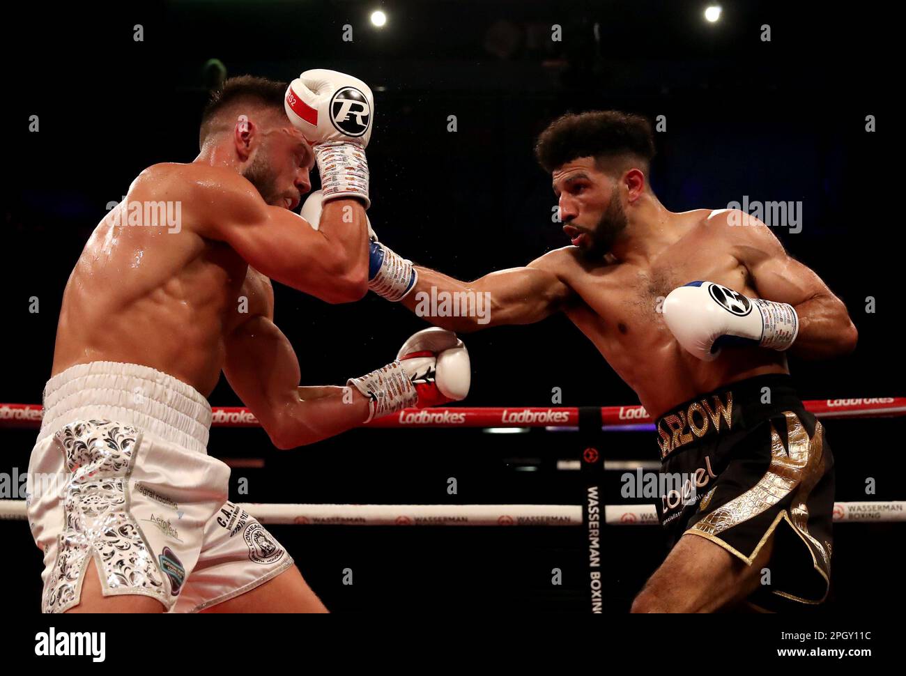 Kane Gardner (right) in action against Conah Walker at the University ...