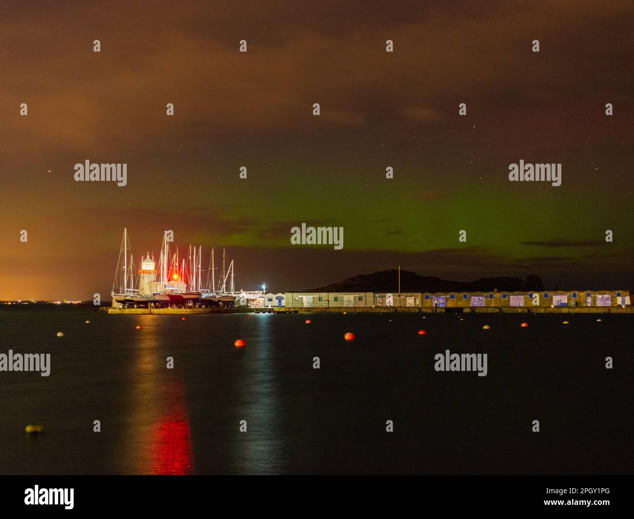 The aurora borealis visible at Howth Harbour as a result of a G3 ...