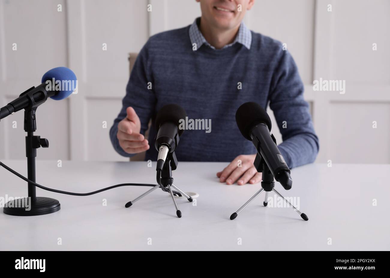 Business man giving interview at official event, closeup Stock Photo ...