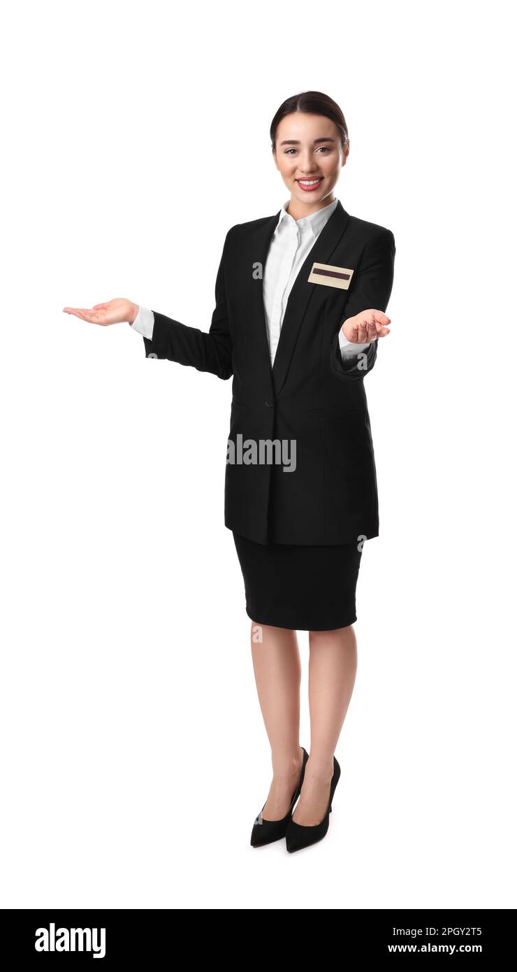 Full length portrait of happy young receptionist in uniform on white ...