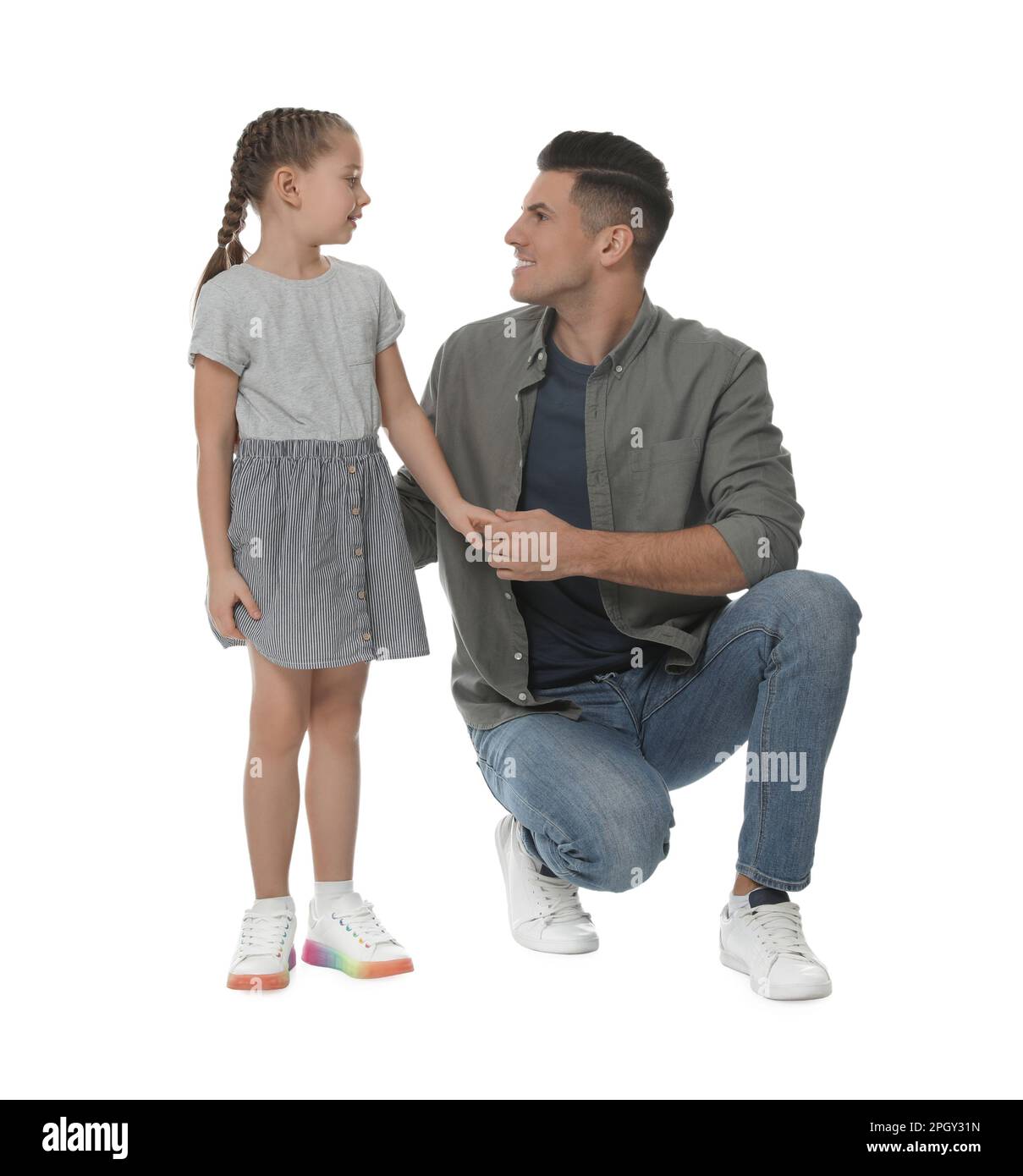 Little girl with her father on white background Stock Photo - Alamy