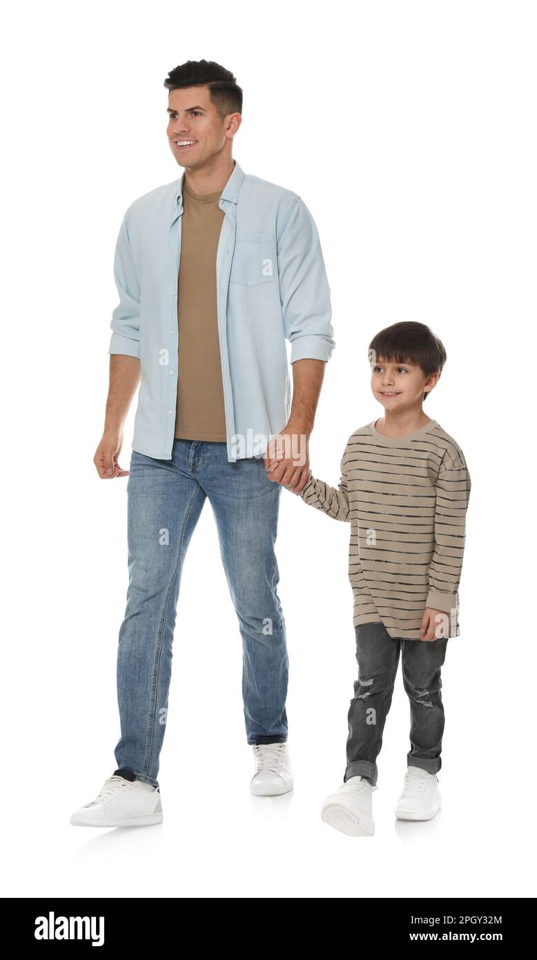 Little boy with his father on white background Stock Photo - Alamy