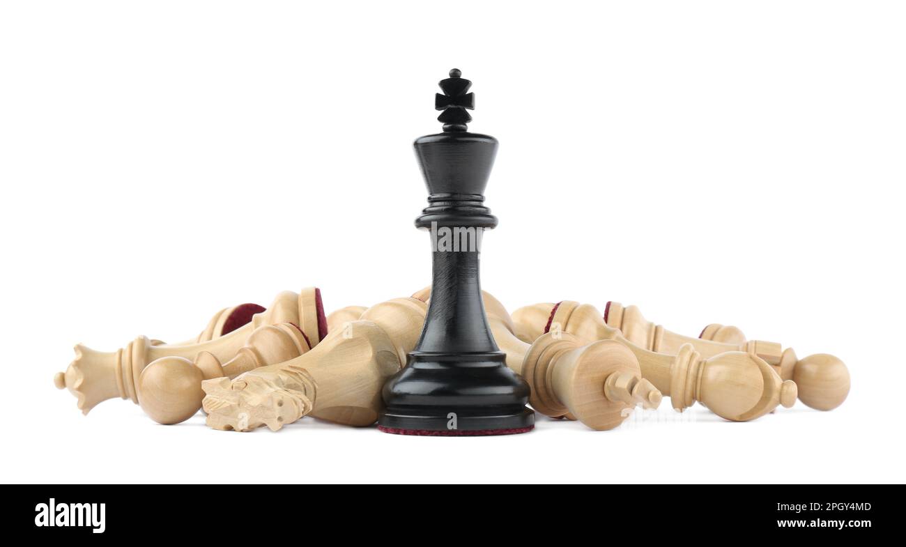 King among fallen chess pieces on white background Stock Photo - Alamy
