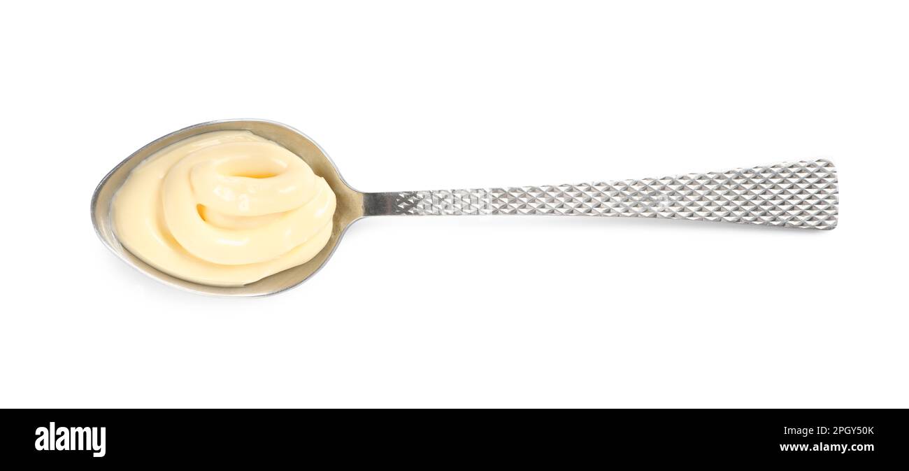 Spoon with tasty mayonnaise isolated on white, top view Stock Photo - Alamy