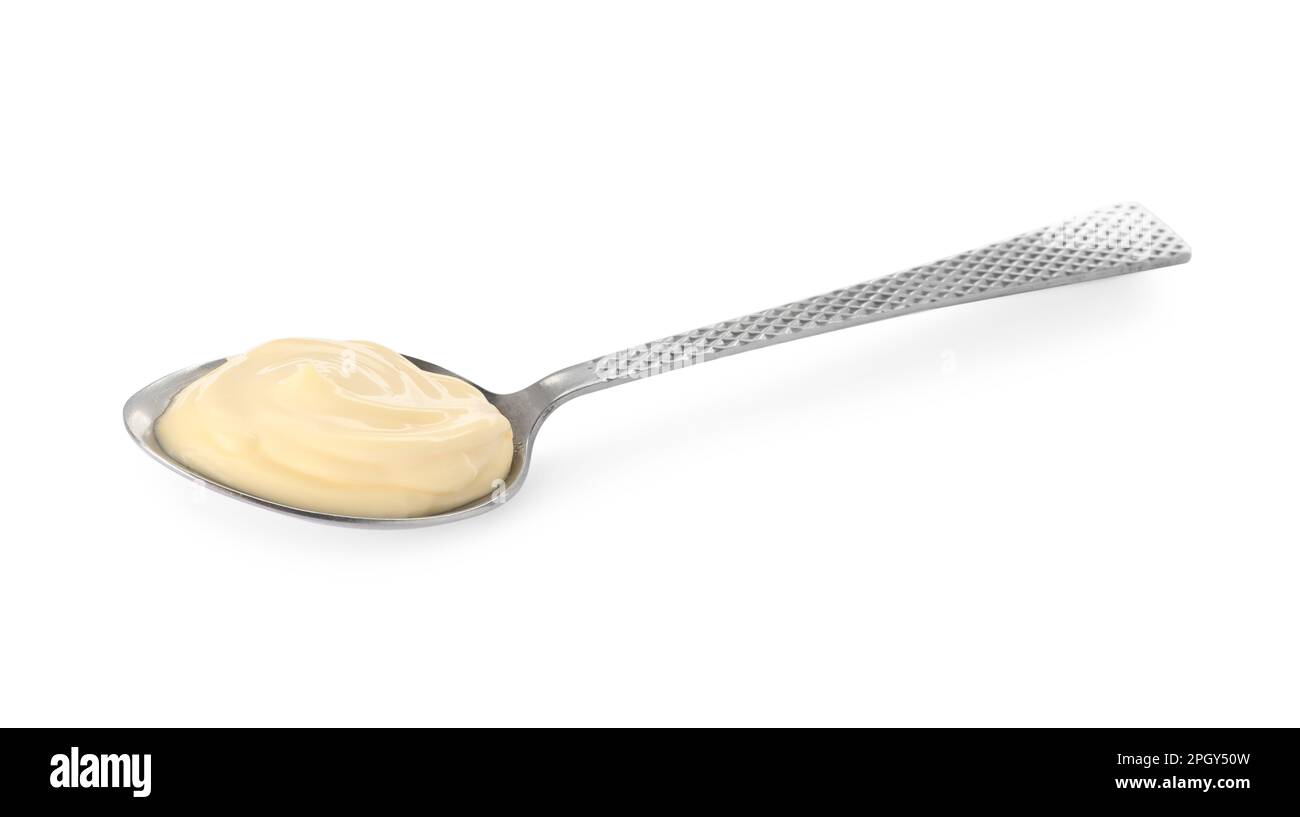 Spoon with tasty mayonnaise isolated on white Stock Photo - Alamy