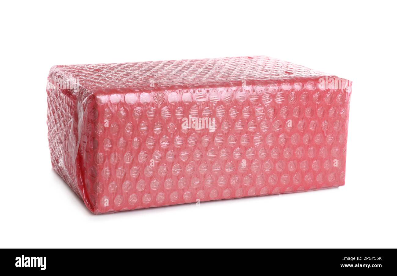 Cardboard box packed in red bubble wrap isolated on white Stock Photo ...