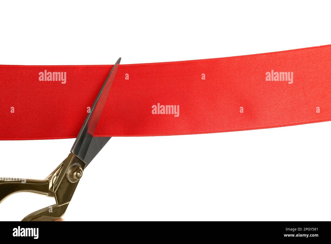 Cutting red ribbon with scissors on white background Stock Photo - Alamy