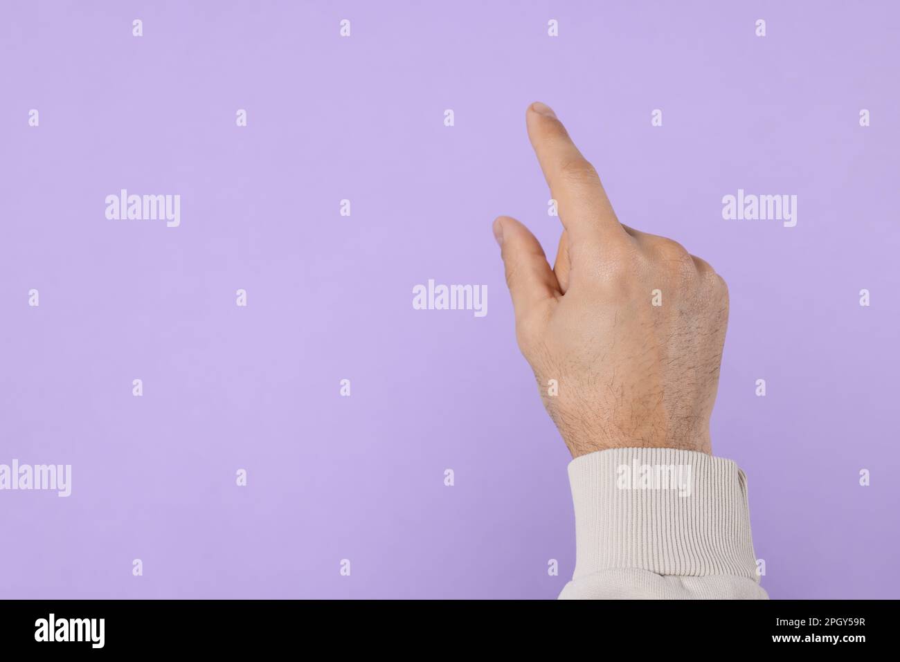 Human hand showing violet hi-res stock photography and images - Alamy