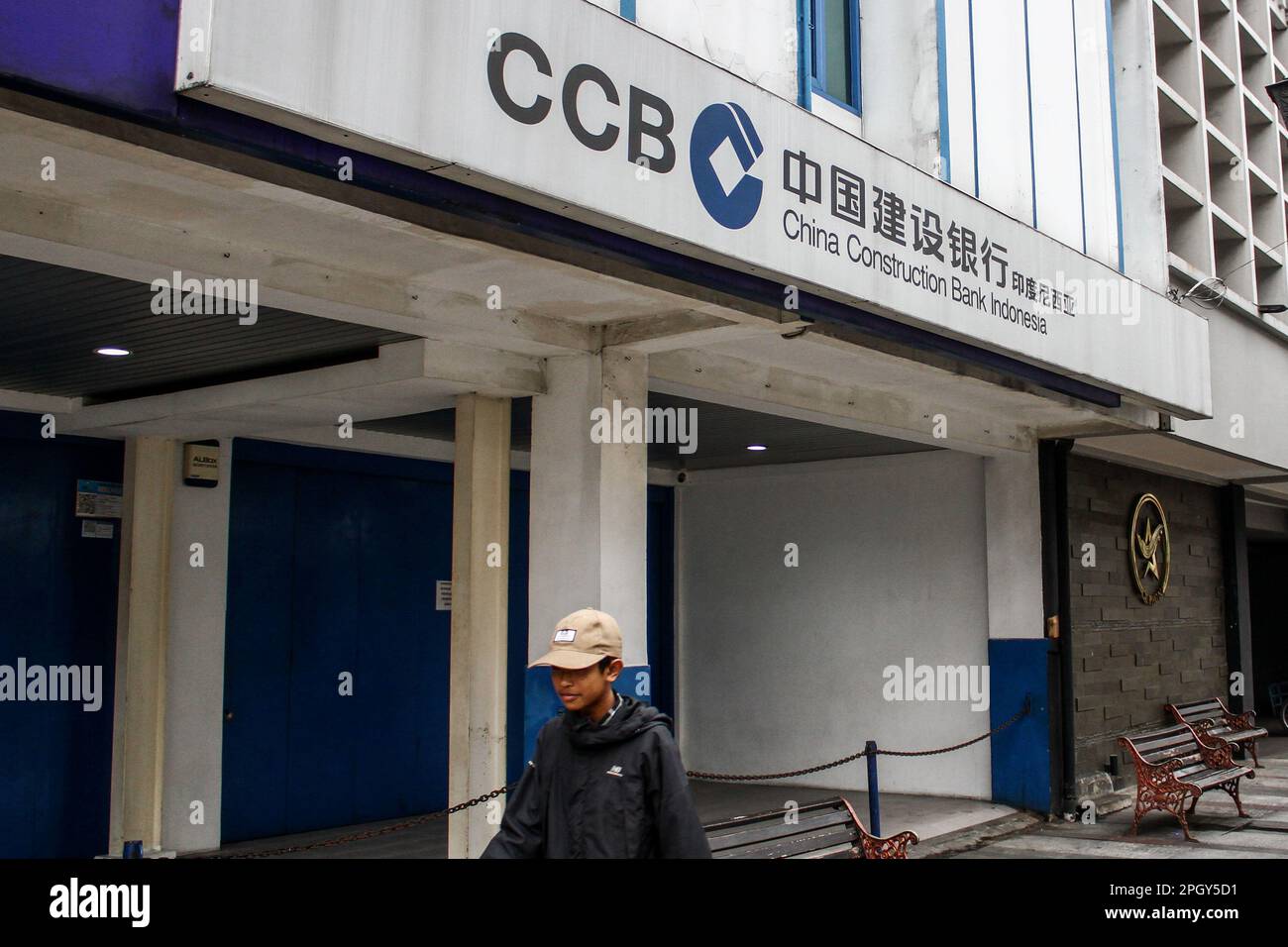 Bandung, West Java, Indonesia. 25th Mar, 2023. A man walk past a China Construction Bank ...