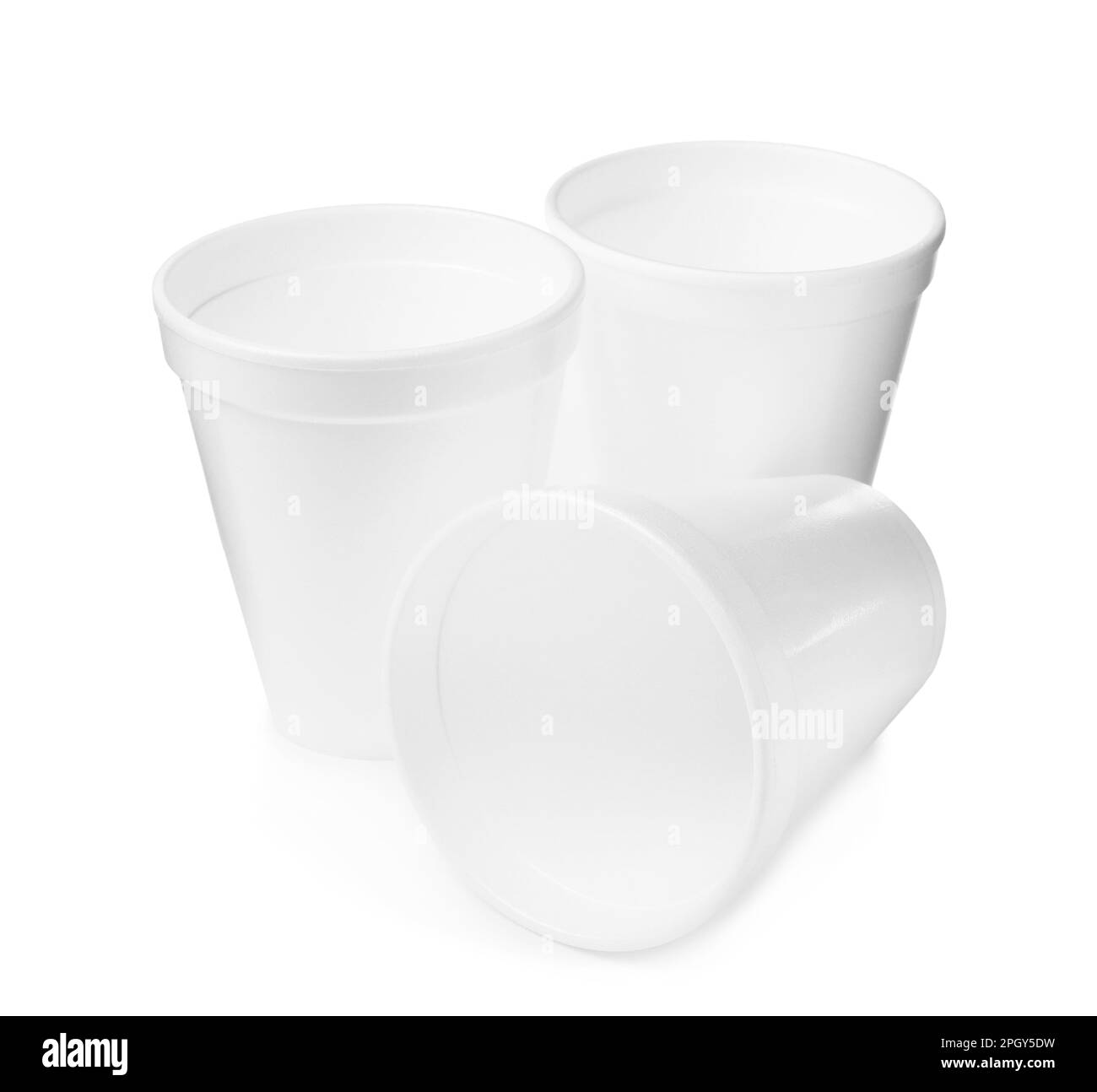 Three clean styrofoam cups on white background Stock Photo - Alamy