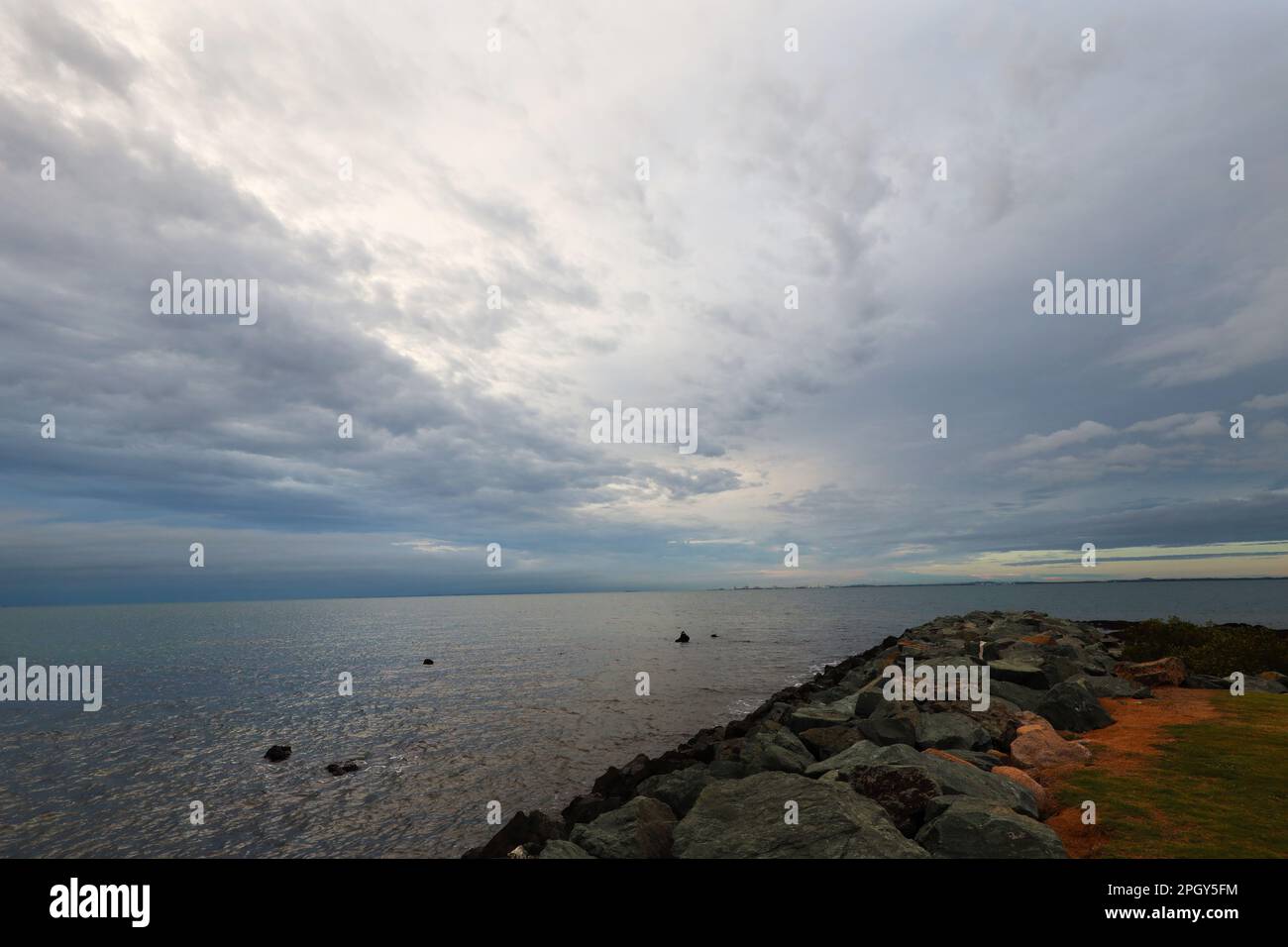 Photo of landscape, ocean and blue cloudy sky Stock Photo - Alamy