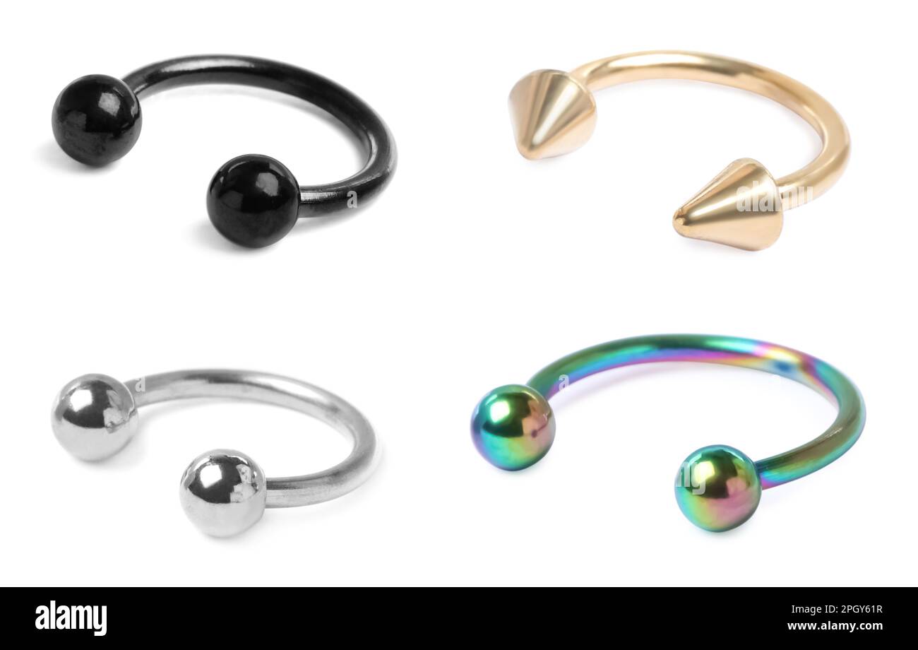 Set with different piercing jewelry on white background Stock Photo - Alamy