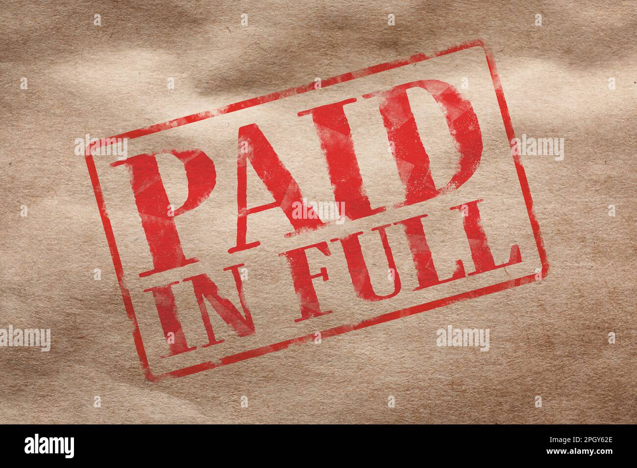 Kraft paper with stamp PAID IN FULL, top view Stock Photo - Alamy