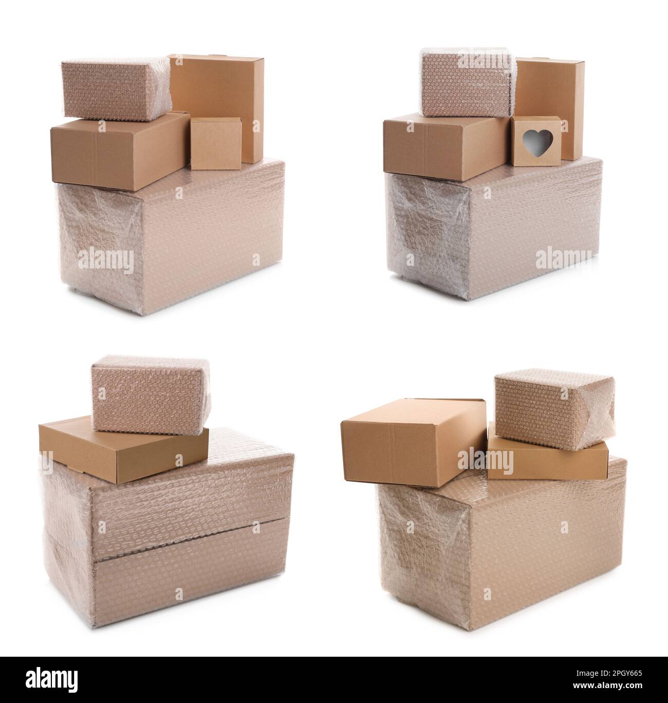 Set with cardboard boxes packed in bubble wrap on white background ...