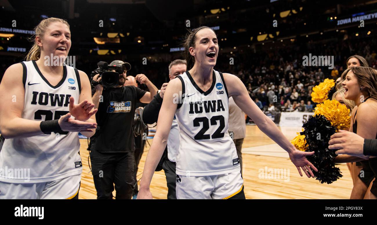 Iowa guard Caitlin Clark (22) and forward Monika Czinano celebrate ...