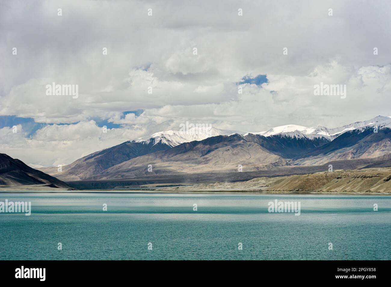 Baisha Lake in the Pamir Plateau of Xinjiang, with Baisha Mountain and ...