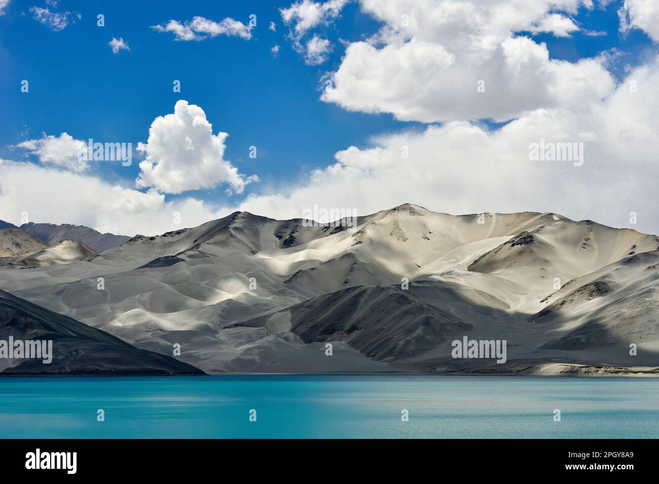 Baisha Lake in the Pamir Plateau of Xinjiang, with Baisha Mountain and ...