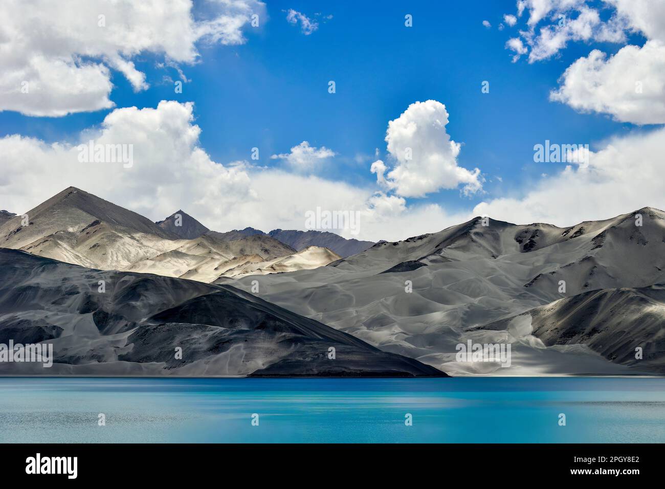 Baisha Lake in the Pamir Plateau of Xinjiang, with Baisha Mountain and ...