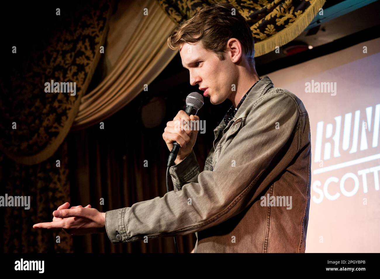 Andrew Michaan performing Stock Photo - Alamy