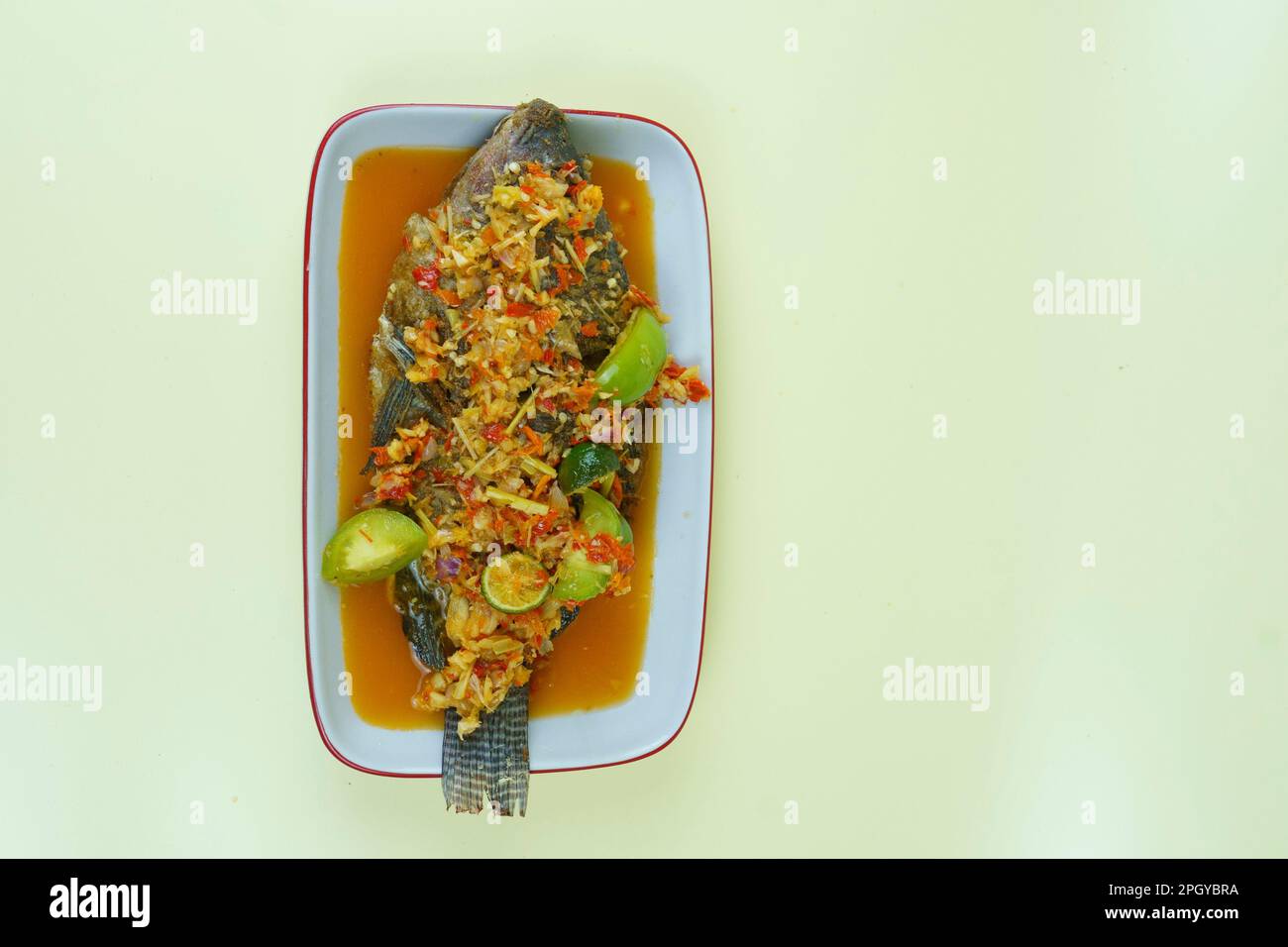 Pecak Ikan Mujair Betawi is a traditional Indonesian dish that ...