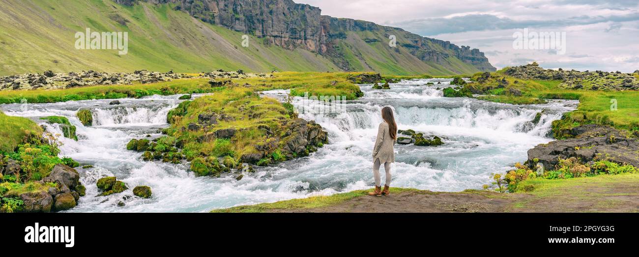 Iceland. Woman by waterfall on Iceland. Multiracial woman portrait in ...