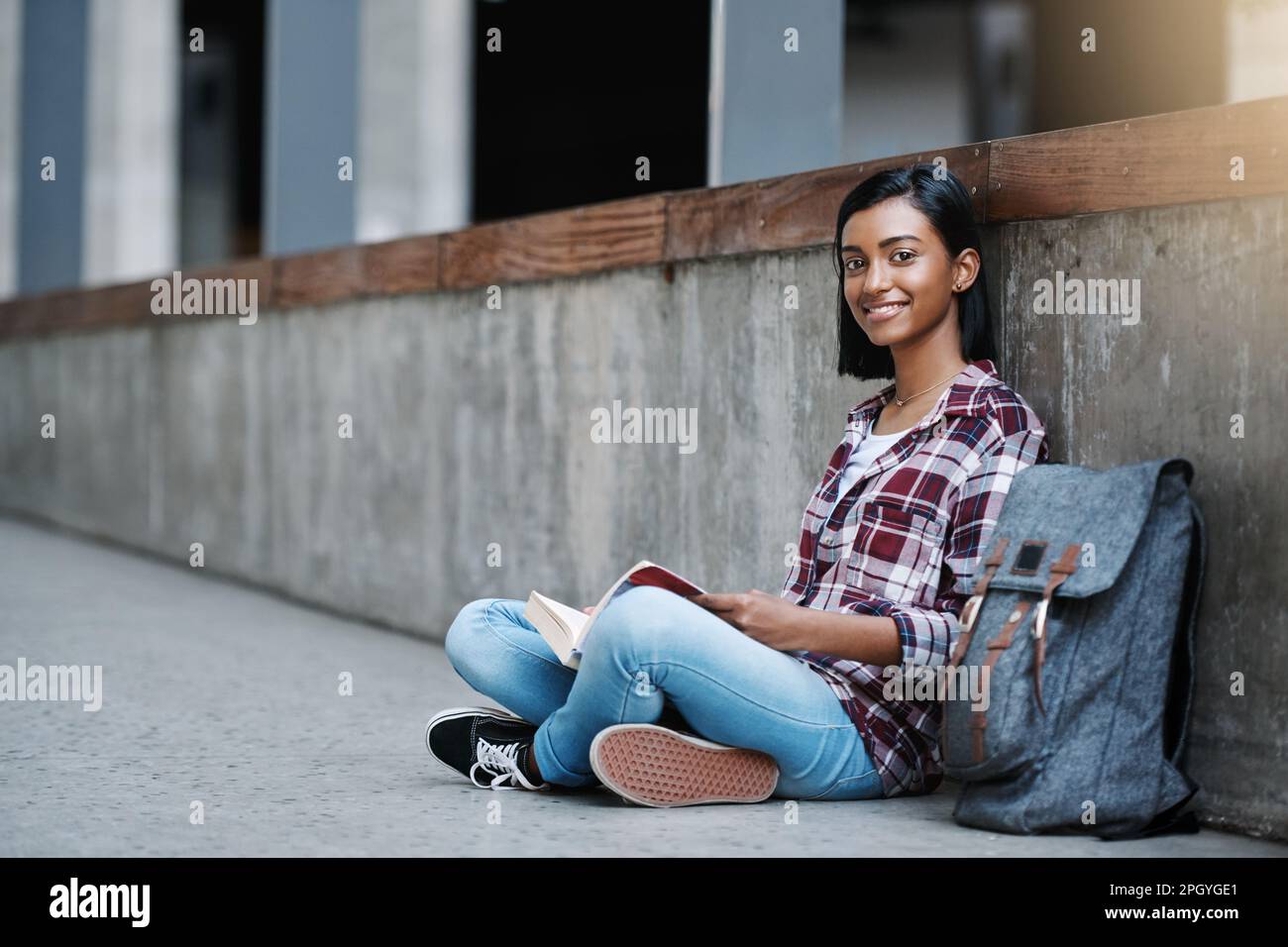 Its my favourite book. Full length portrait of an attractive young ...