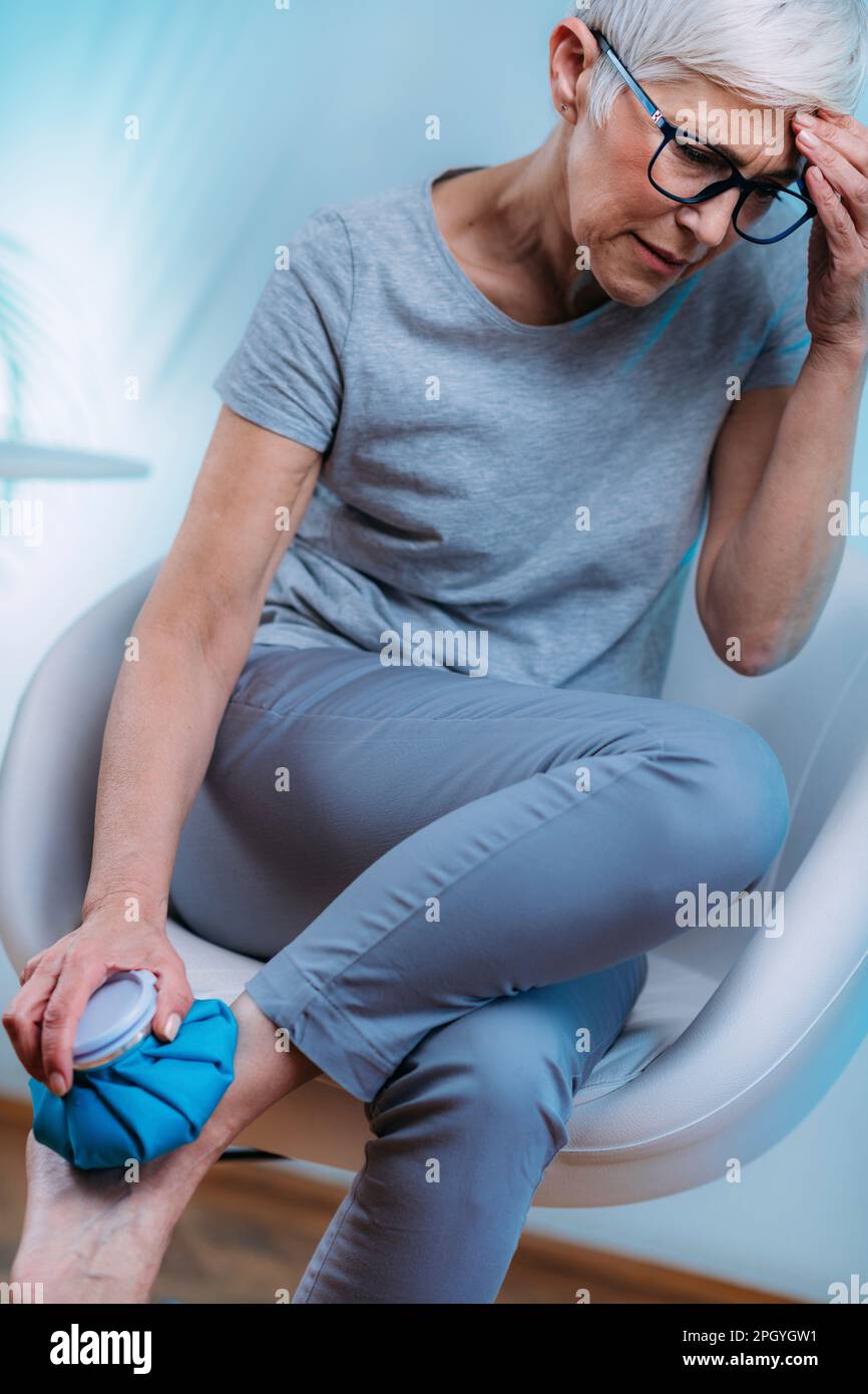 Ankle pain treatment Stock Photo - Alamy