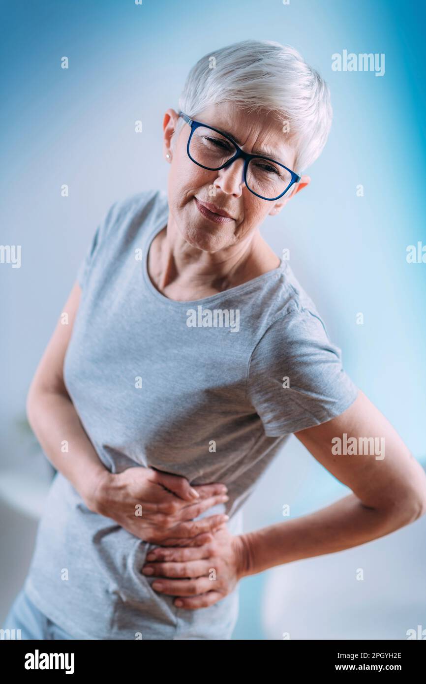Woman in pain Stock Photo - Alamy
