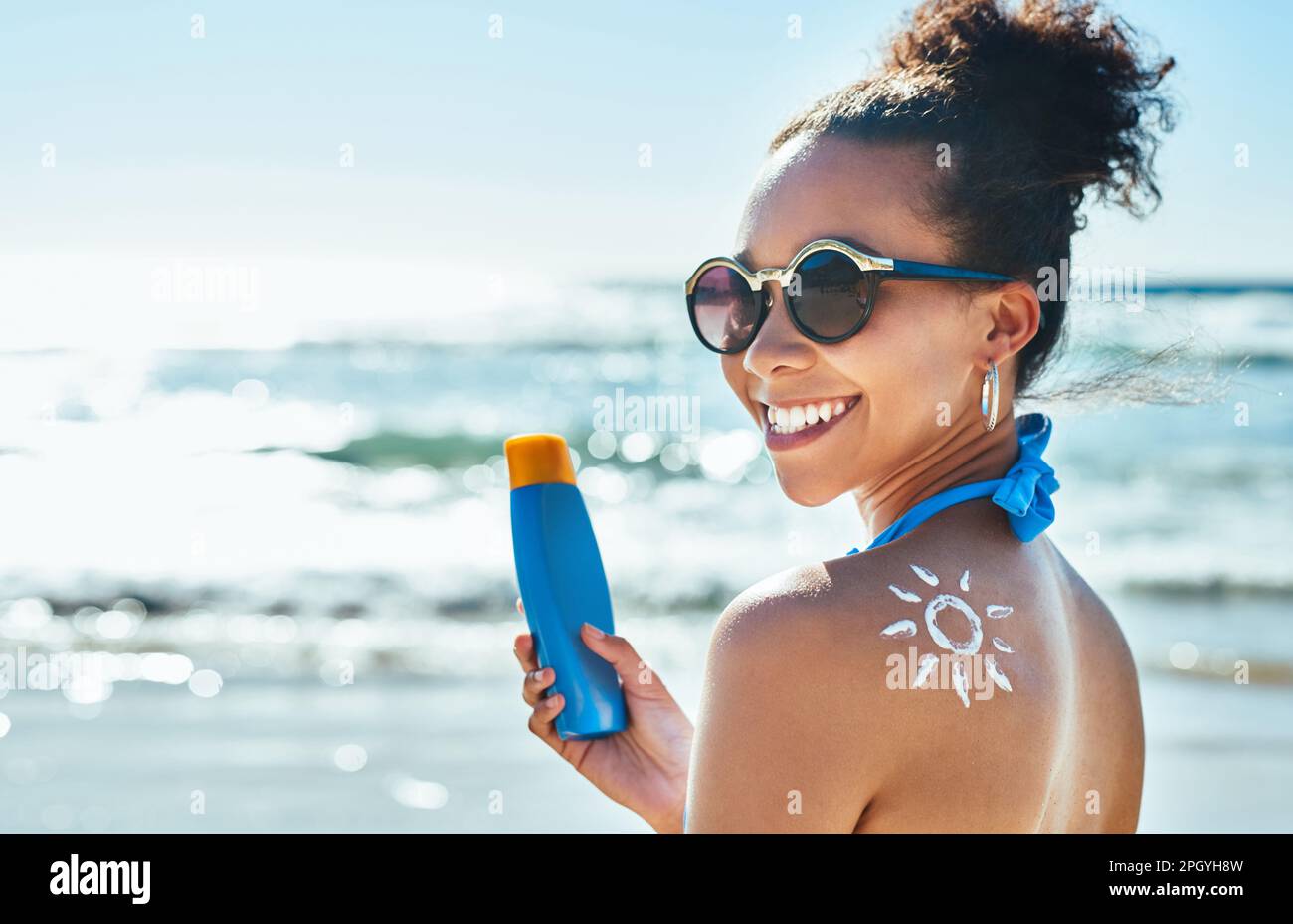 I love the sun but I love my skin more. Portrait of a beautiful young ...