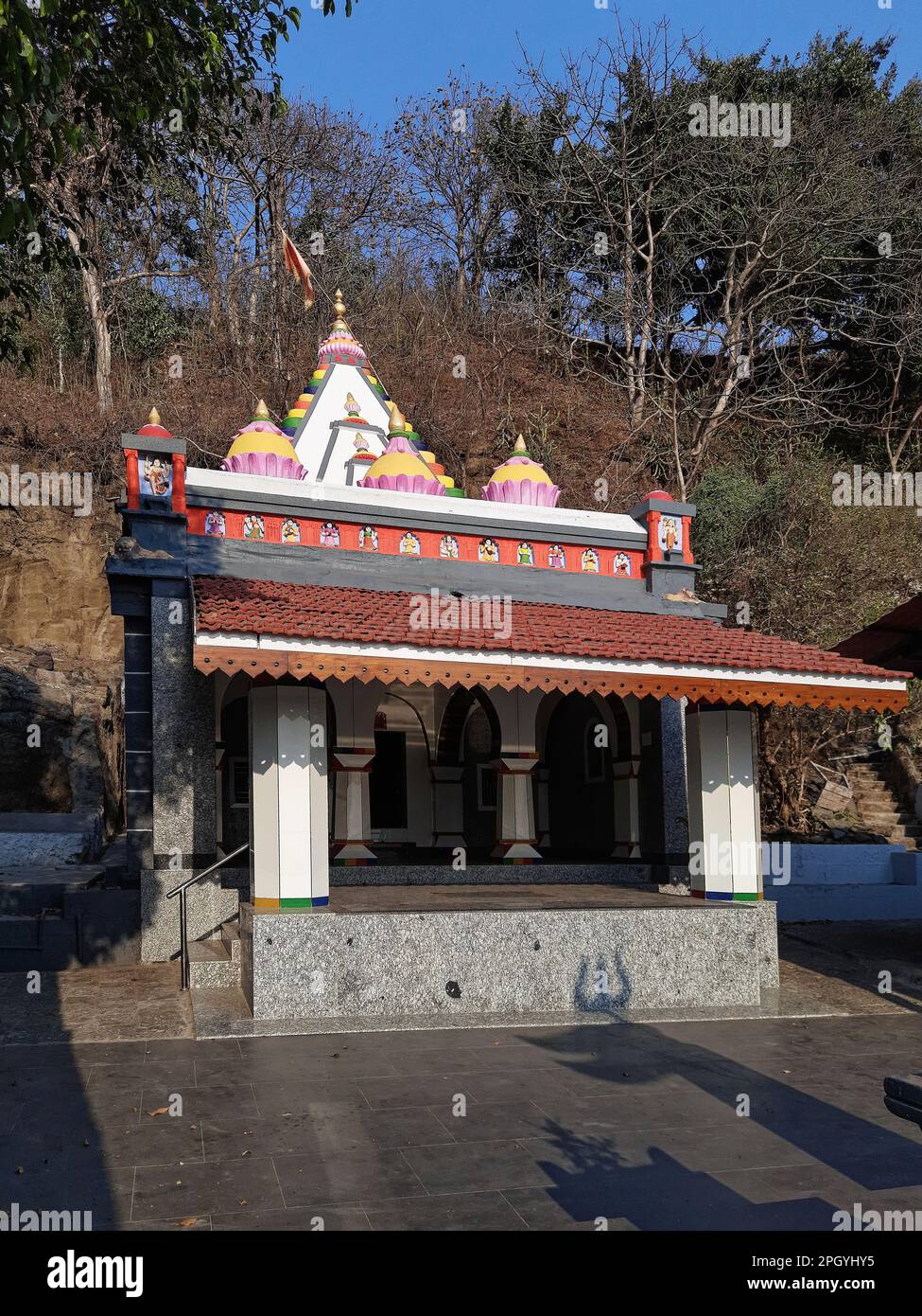 Well decorateda and painted temple of Shiva God at Chaul near Alibag ...