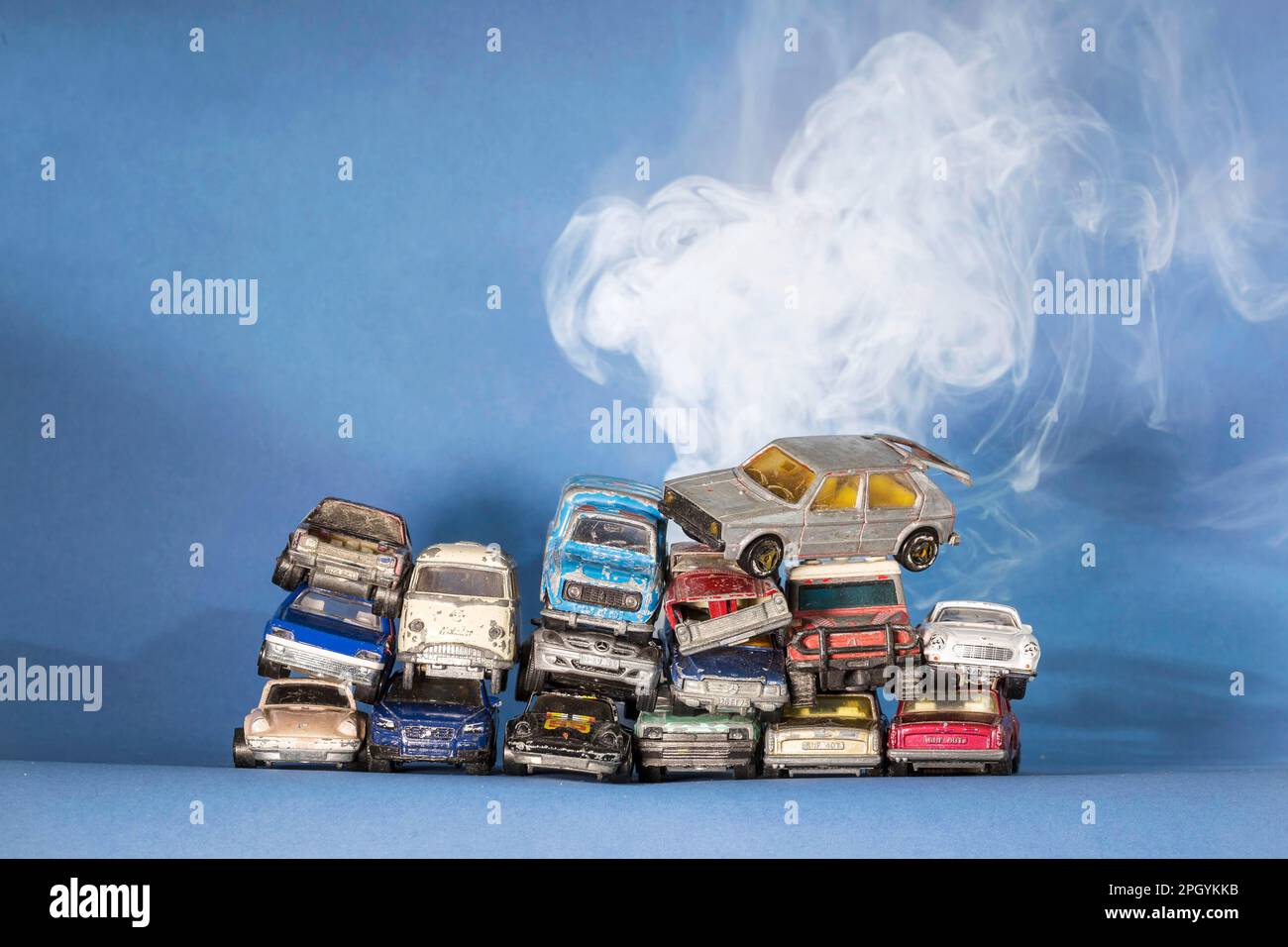 Symbol photo scrap cars, broken Matchbox toy vehicles, climate change ...