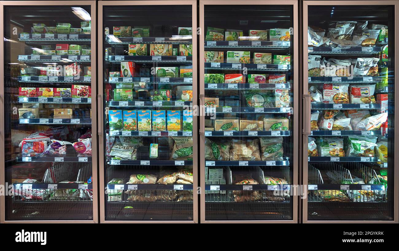 Various frozen vegetable foods in freezers in a supermarket, Bavaria ...