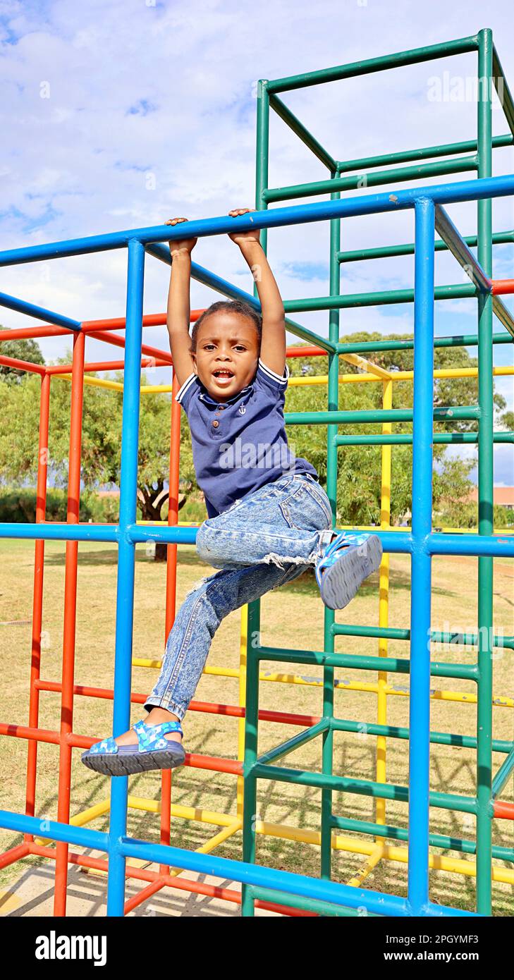 Kids Playing On Monkey Bars