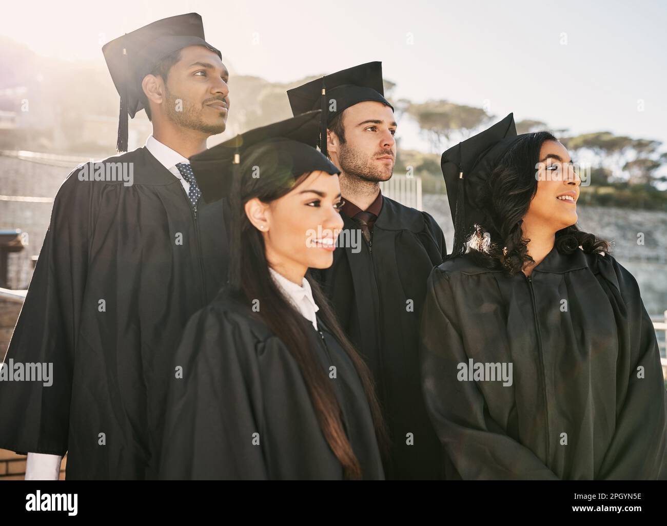 Keeping a positive outlook on their future. a group of students ...