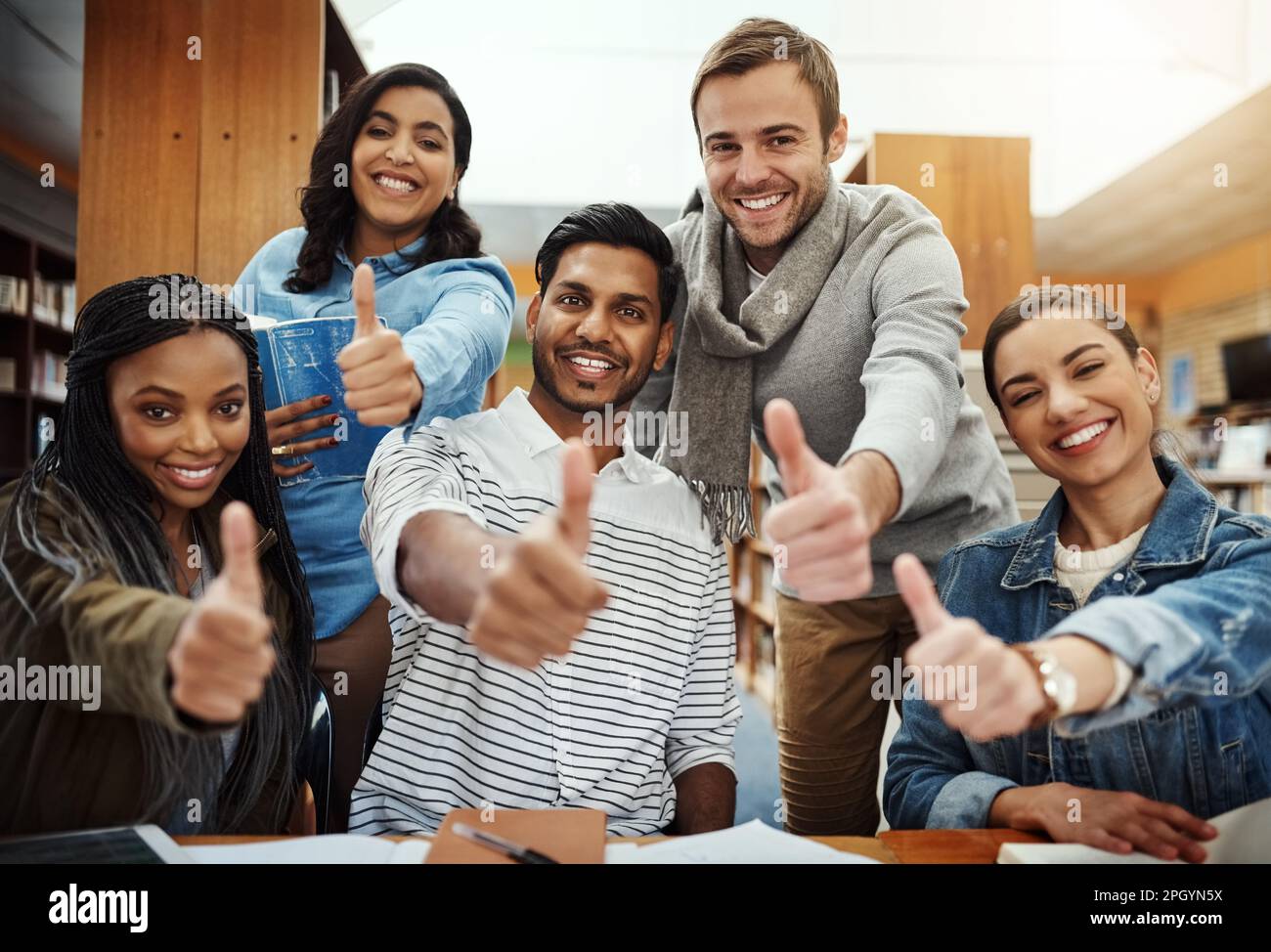 Our studies are going great. Cropped portrait of a group of university ...