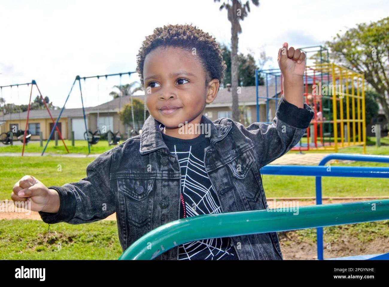 black cute African boy child looking up smiling Stock Photo - Alamy