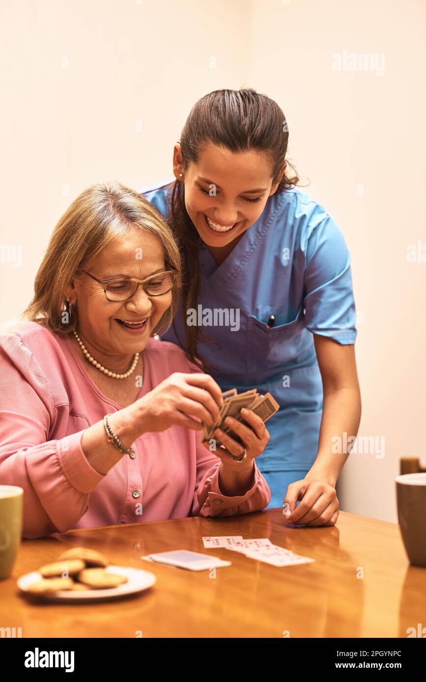 Youre better than you thought. a female nurse teaching her patient how ...