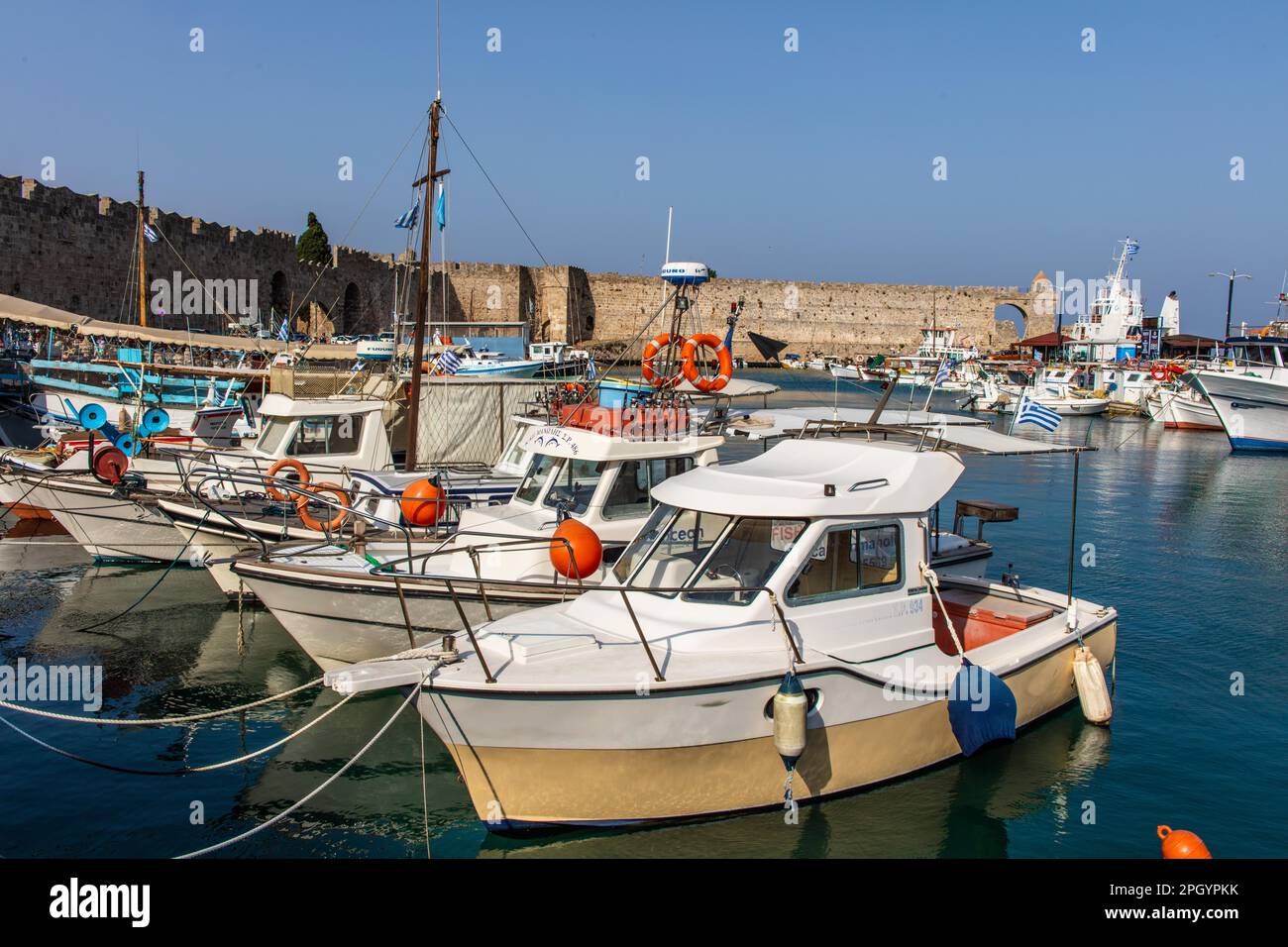Mandraki Harbour, Rhodes Town, Greece Stock Photo - Alamy
