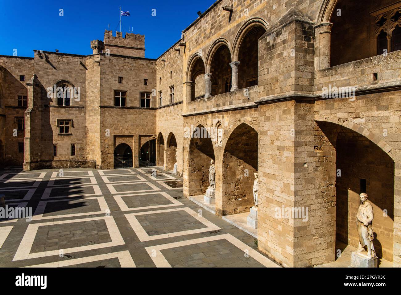 Inner courtyard surrounded by arcades with statues from Hellenistic and ...
