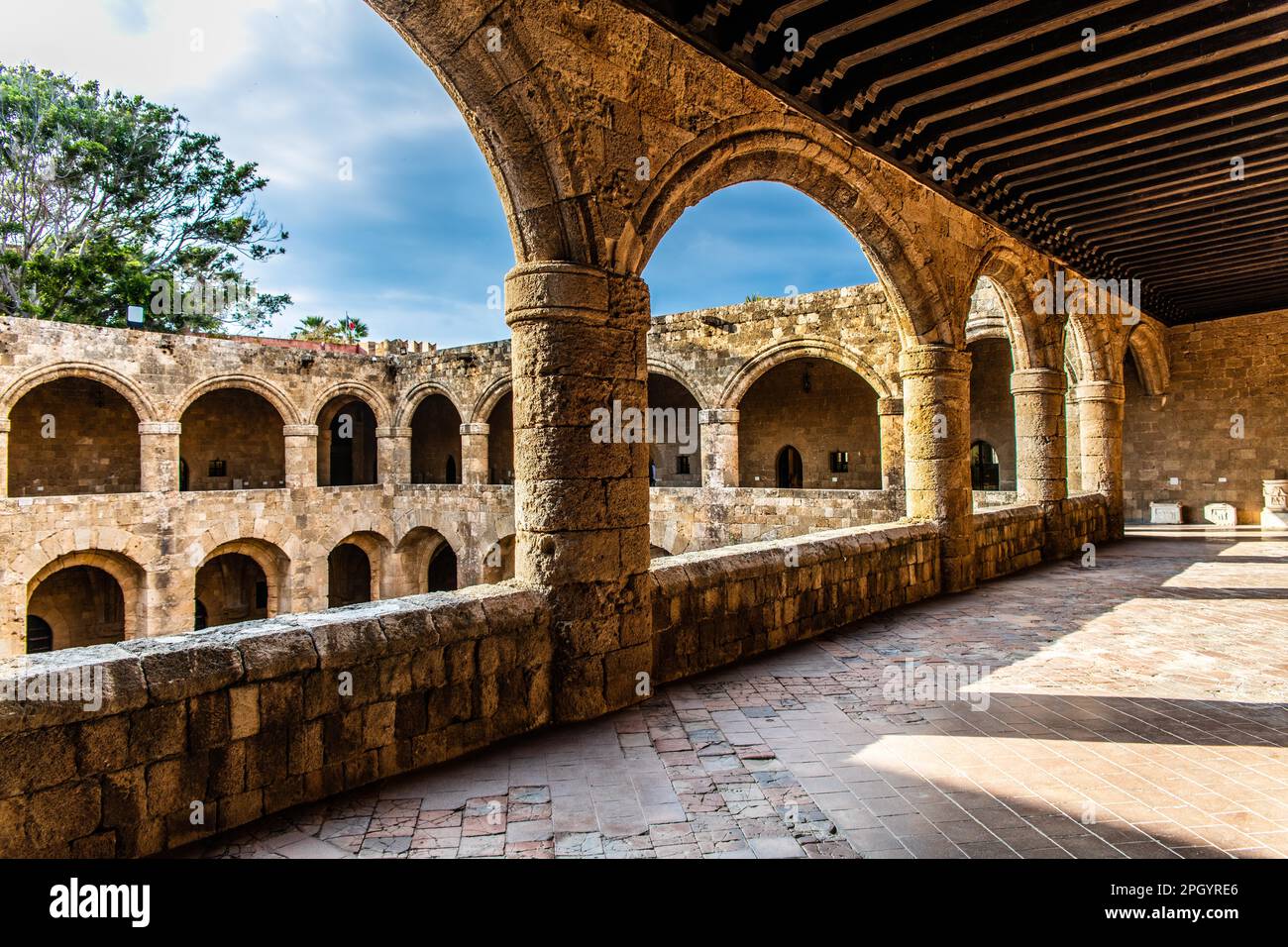 Two-storey building with a large courtyard and surrounding arcade ...