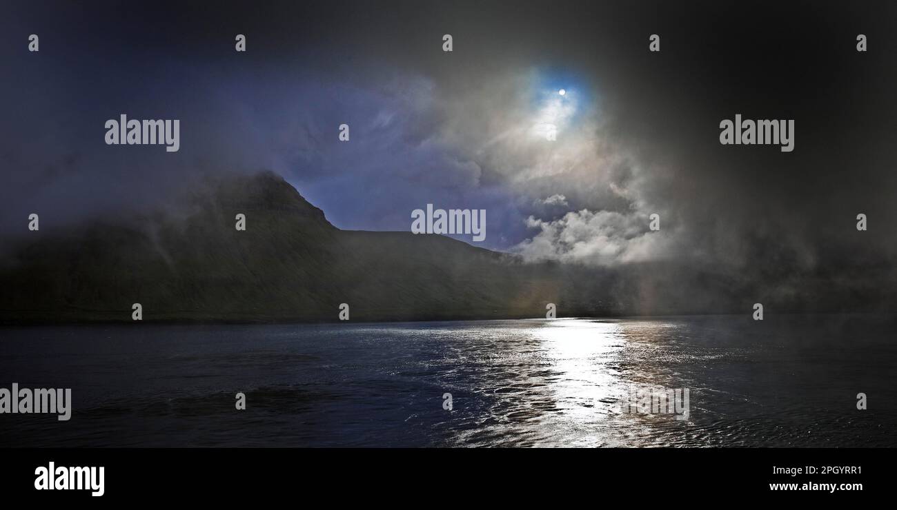 The island of Kalsoy in the North Atlantic with dramatic light mood of ...