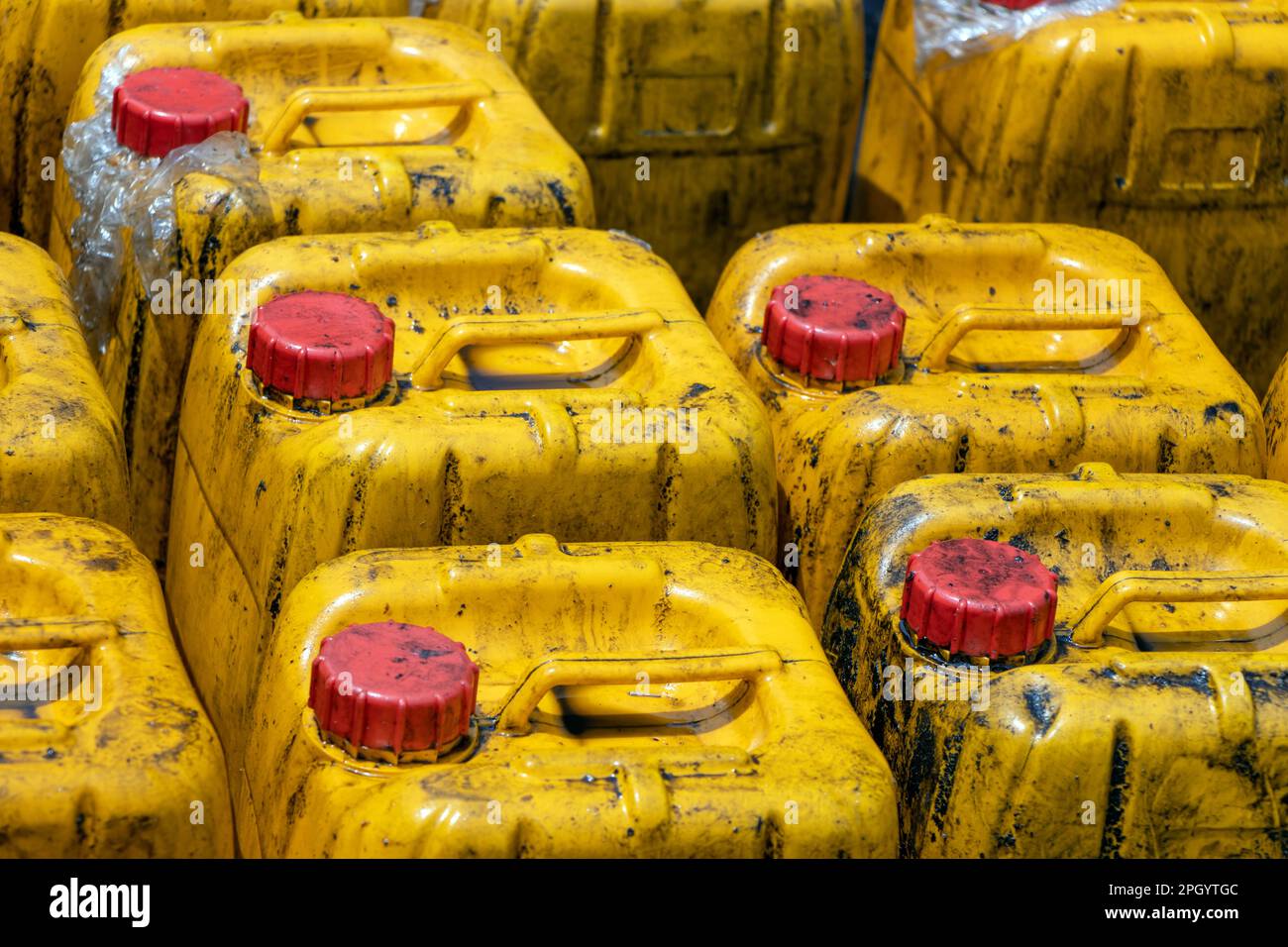 Stock of dirty plastic jerry cans Stock Photo - Alamy