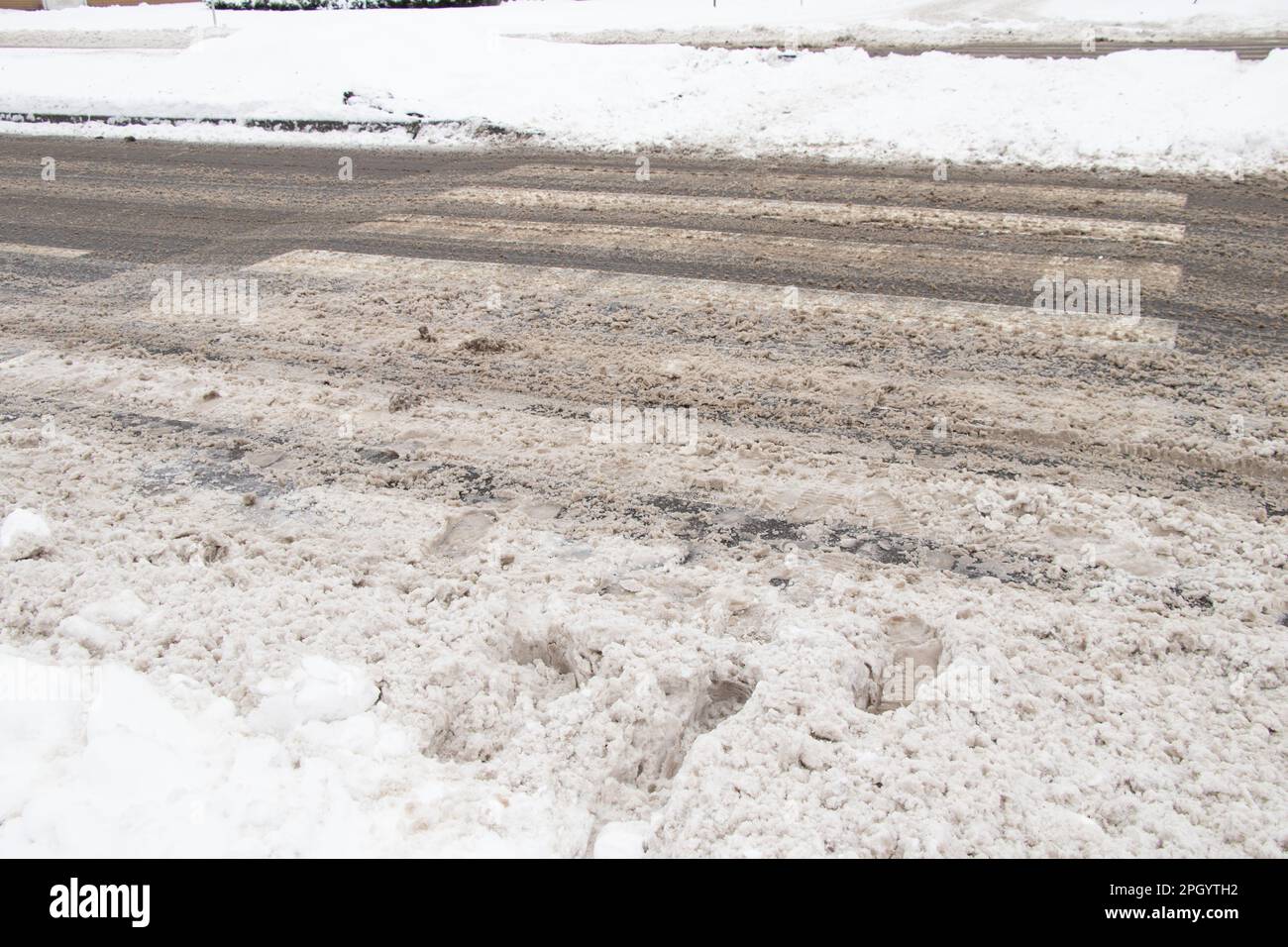 road in snow and mud in the city in winter Stock Photo - Alamy