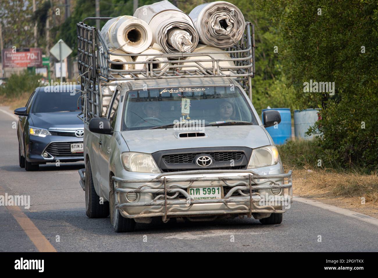 BANGKOK, THAILAND, MAR 11 2023, Pickup truck loaded with paper rolls ...