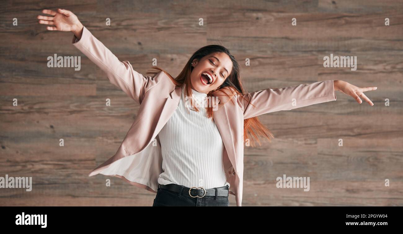 Freedom, dance and happy with woman on wall background for crazy ...